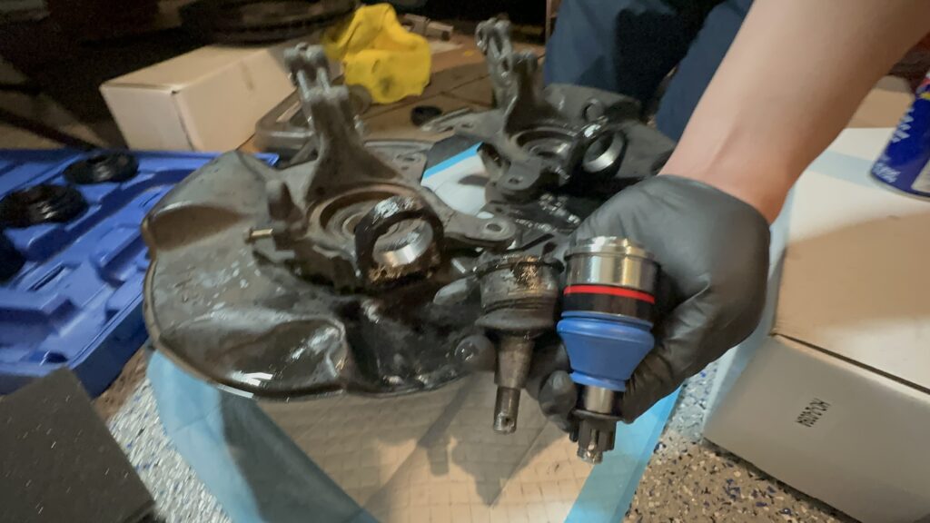 Removing torn ball joints & installing Buddy Club P1 Roll Center ball ...
