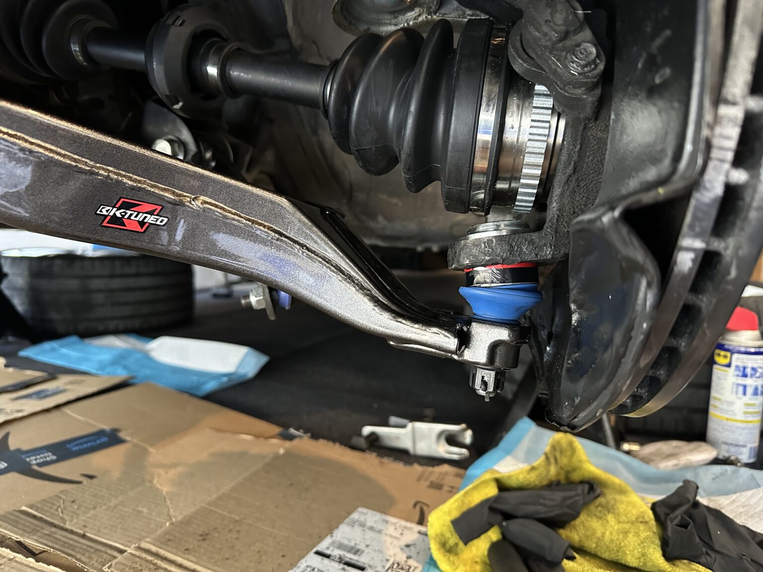 Removing torn ball joints & installing Buddy Club P1 Roll Center ball ...