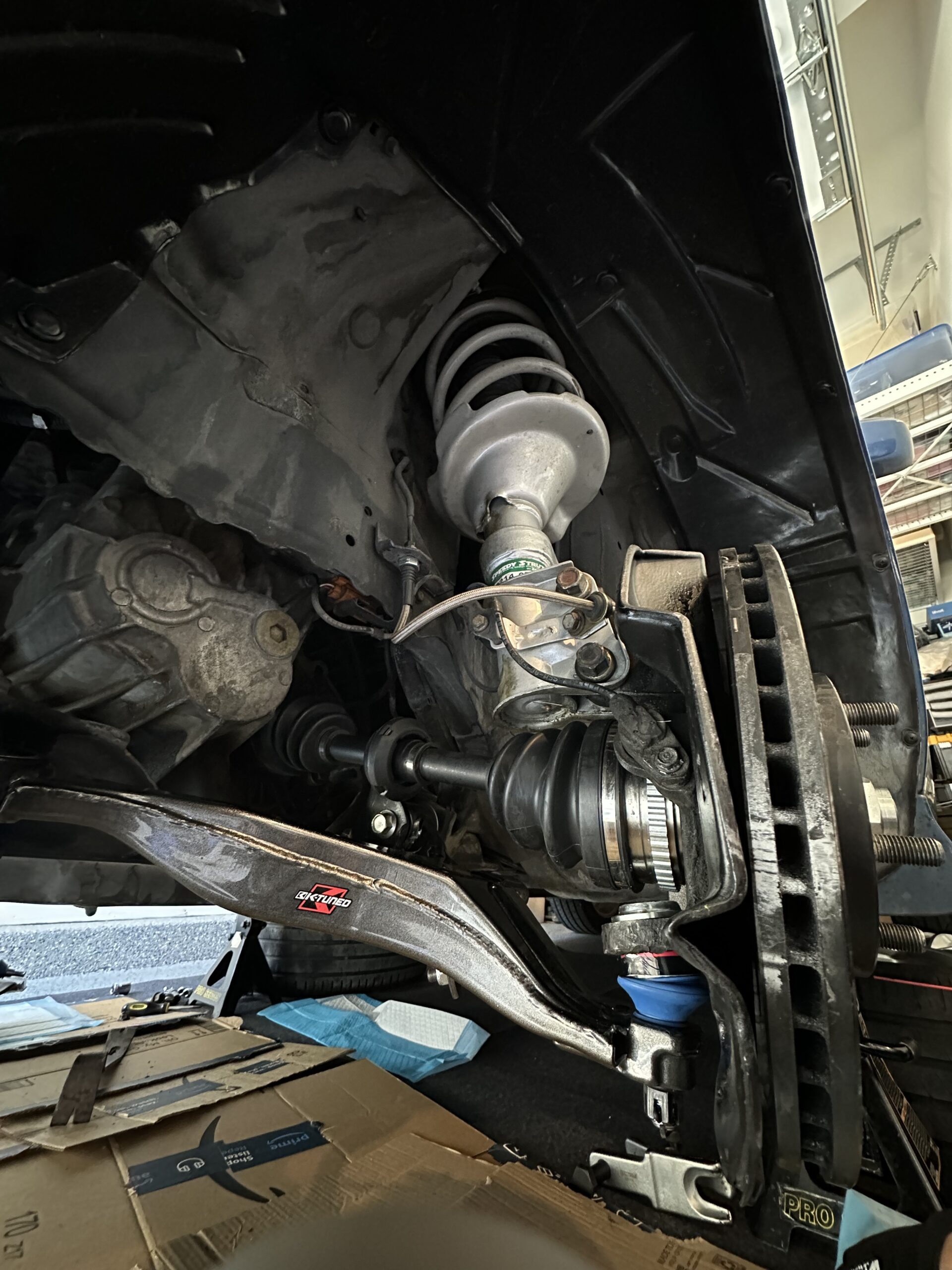 Removing torn ball joints & installing Buddy Club P1 Roll Center ball ...